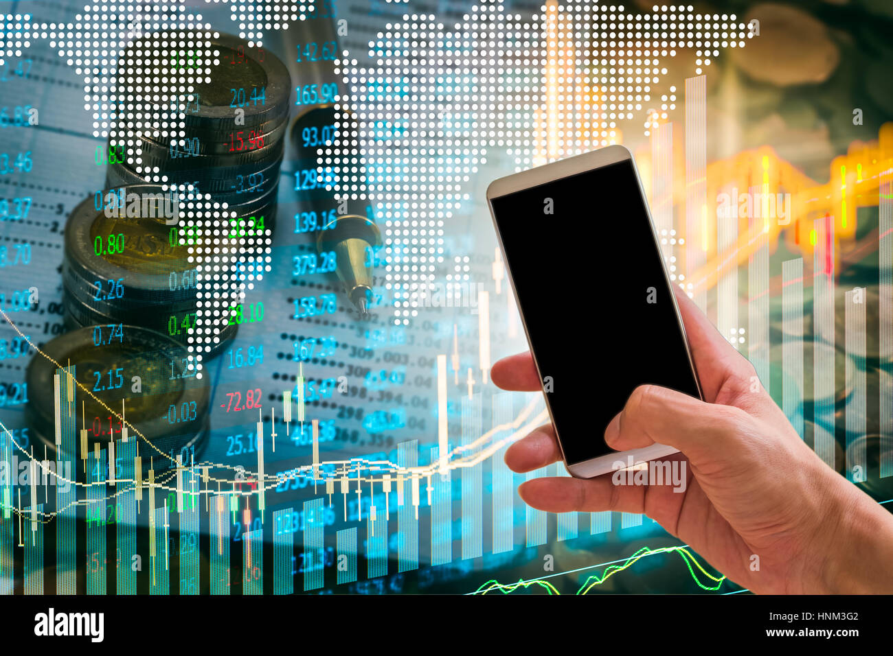 Hand hold smart phone on stock market indicator and financial data ... Hand hold smart phone on stock market indicator and financial data ...