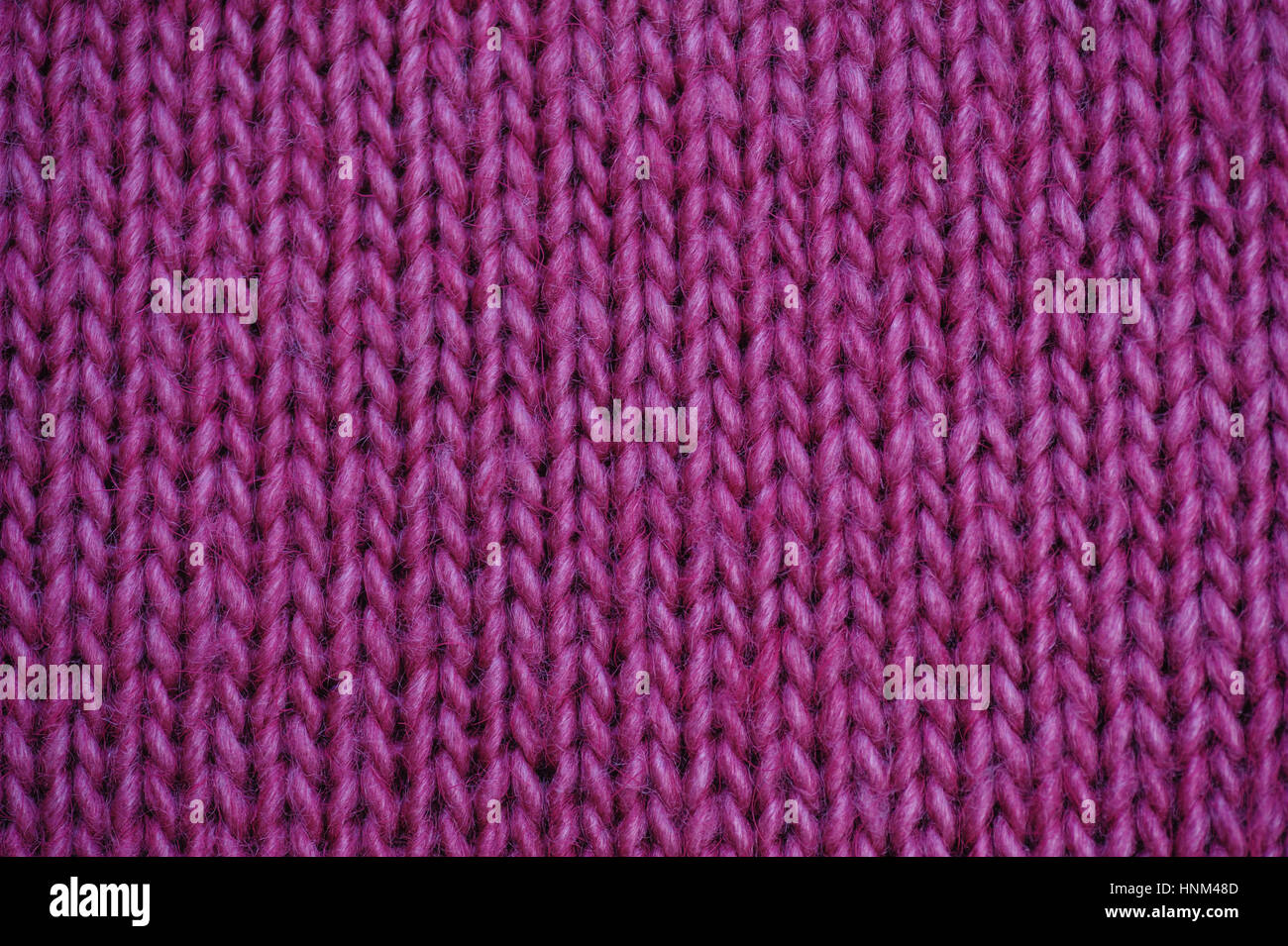 texture of lilac knitted fabric for the background Stock Photo - Alamy