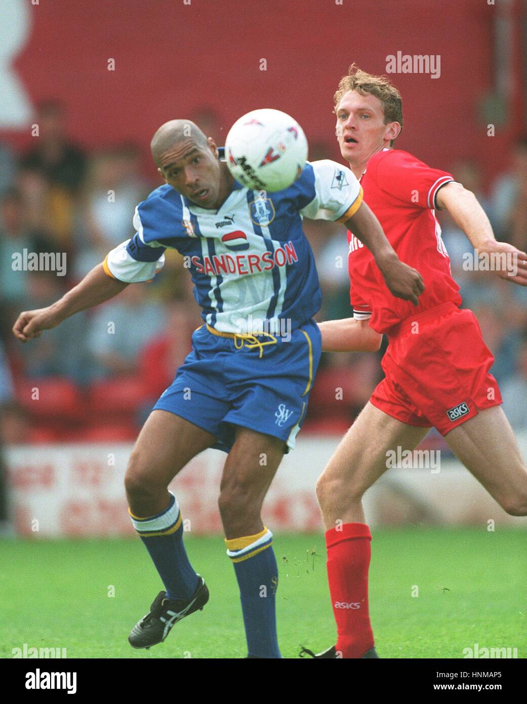 DES WALKER CLEARS THE BALL SHEFF WED V AARHUS 25 July 1995 Stock Photo ...