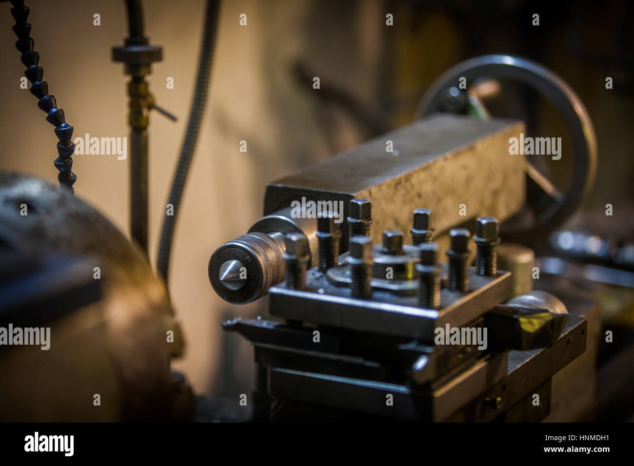 Color image of an old lathe in a workshop Stock Photo - Alamy