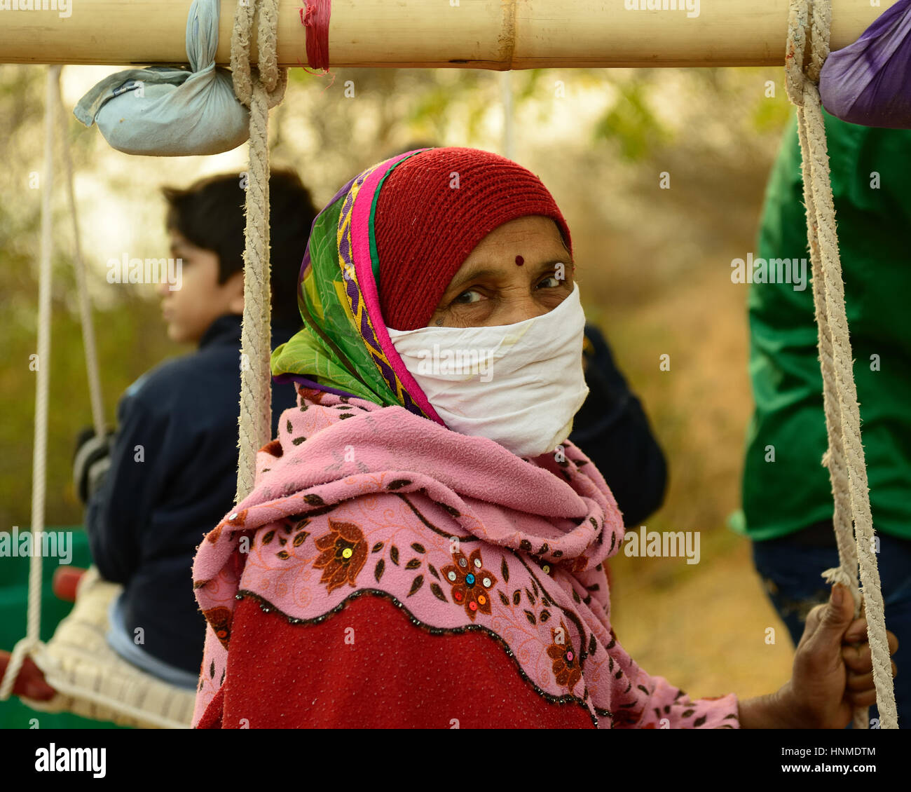 PALITANA, GUJARAT, INDIA - JANUARY 25: Indian pilgrims carried on ...