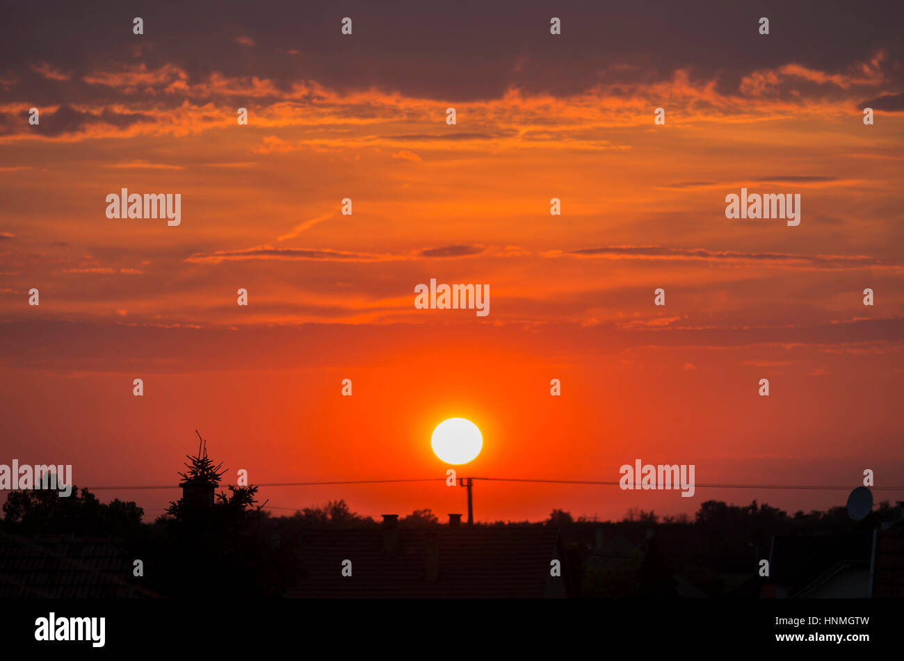 Cloudy sunset sky Stock Photo - Alamy