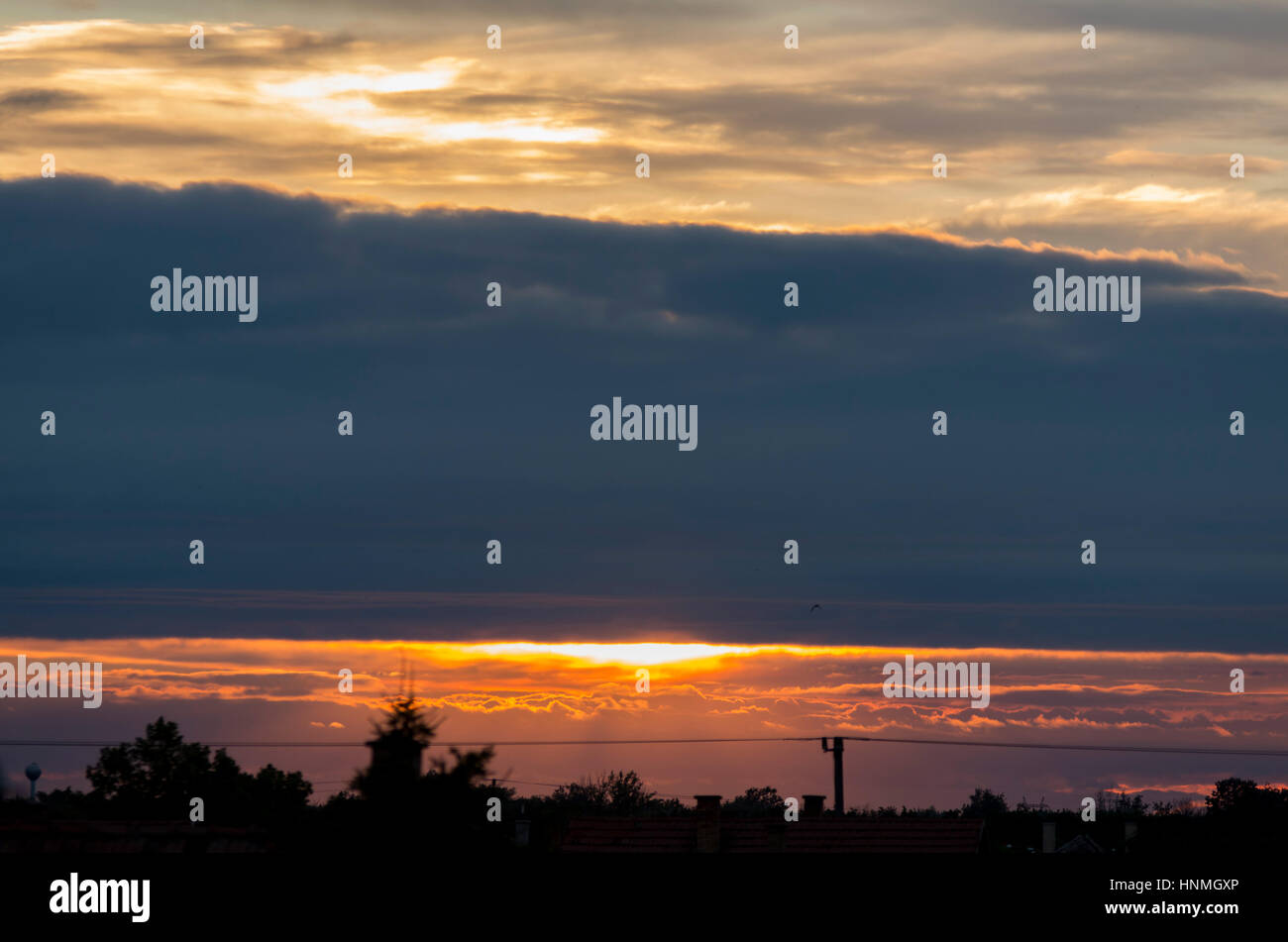 Cloudy sunset sky Stock Photo - Alamy