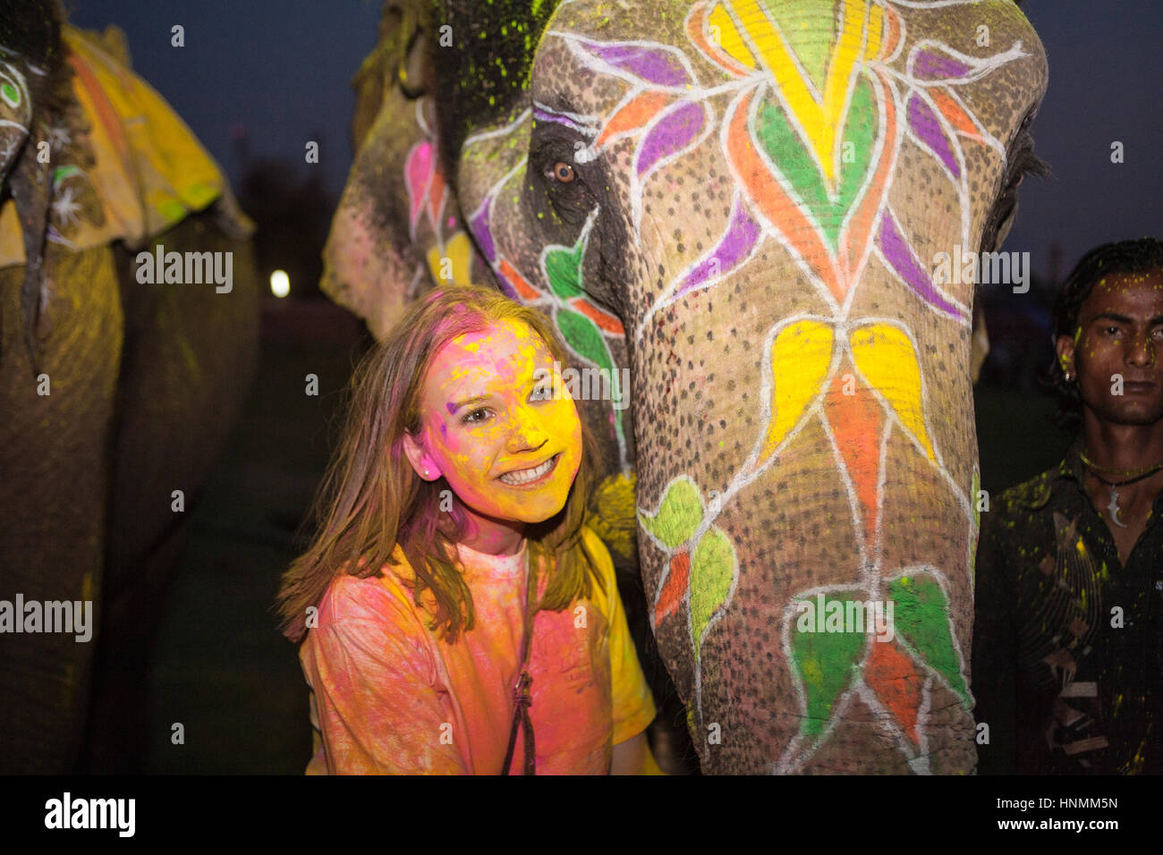 Coloured dye throwing and face smearing of bright coloured powder ...