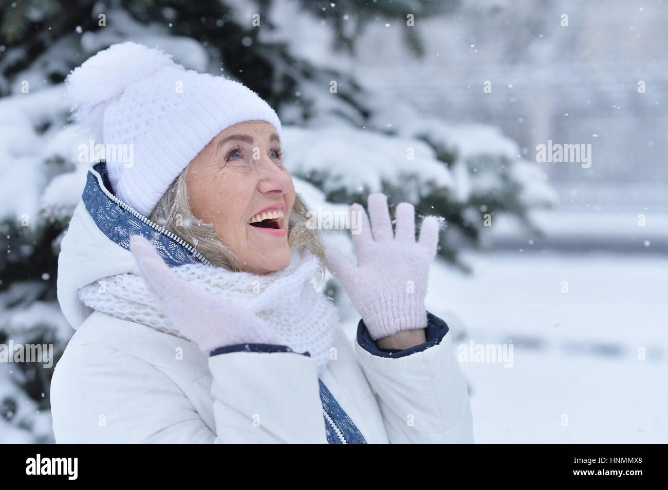 Senior woman in frosty winter Stock Photo - Alamy