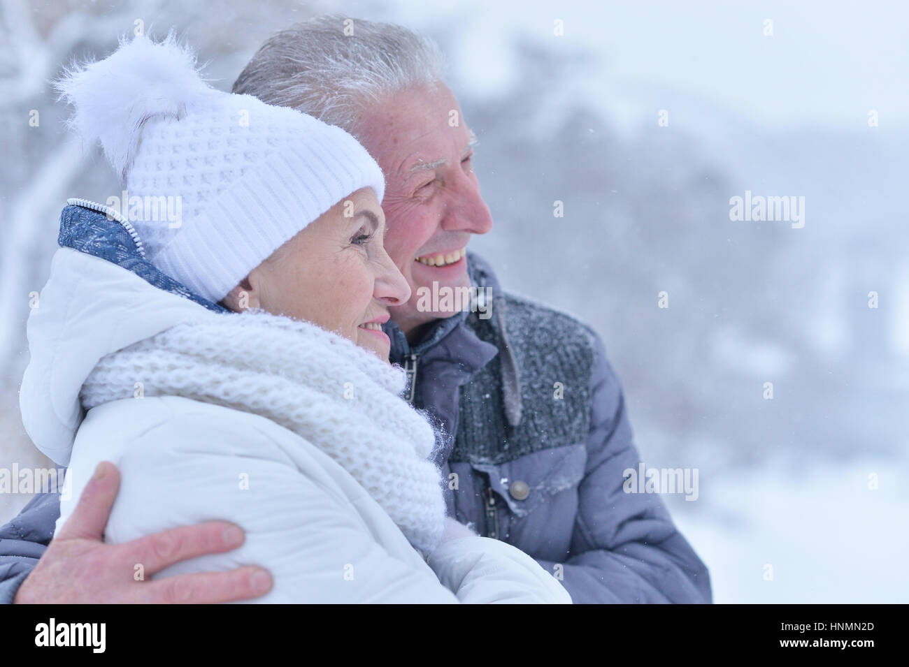 Elderly couple in winter Stock Photo - Alamy