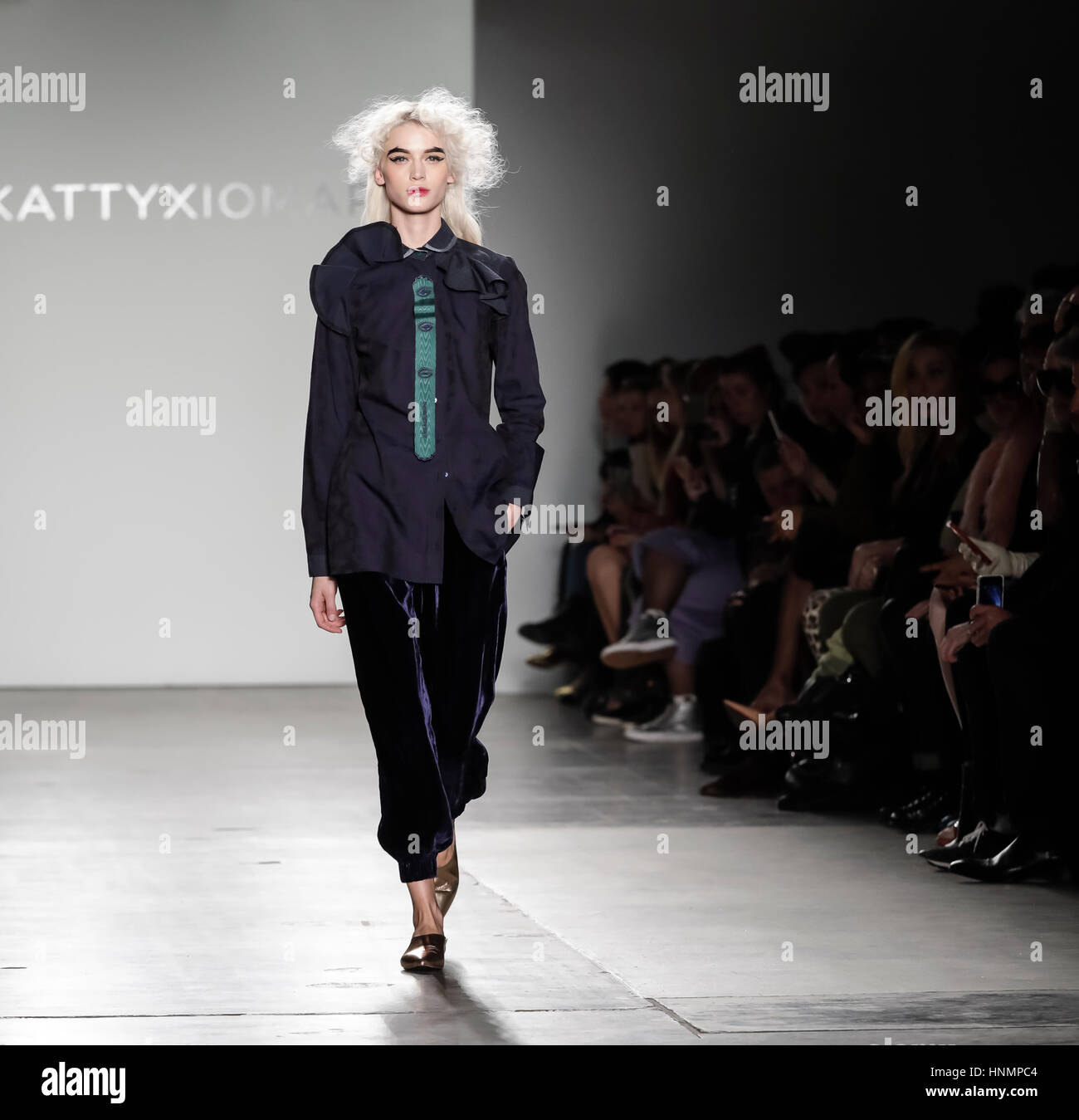 New York, NY, USA. 13th Feb, 2017. A model walks runway for the Katty ...