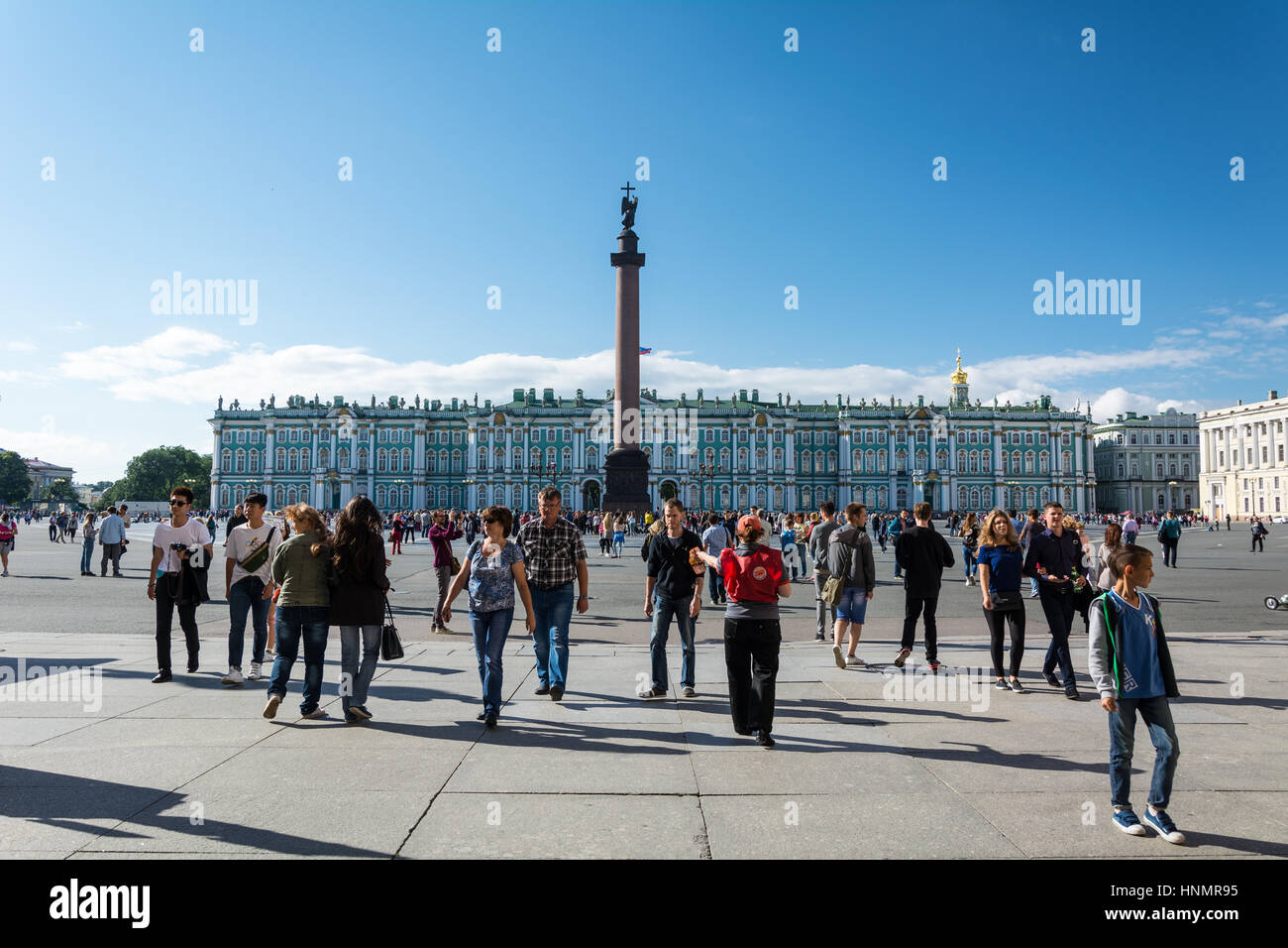 ST. PETERSBURG, RUSSIA - JULY 16, 2016: Tourists walk on the Palace ...