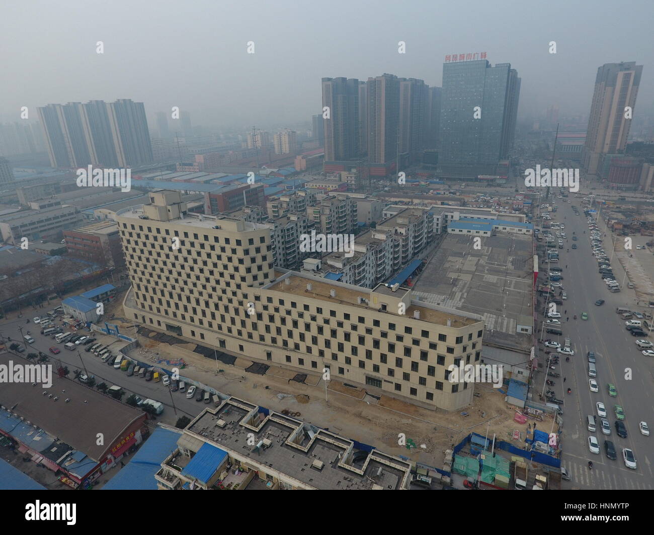 Zhengzhou, Zhengzhou, China. 14th Feb, 2017. A 11-storey building looks ...