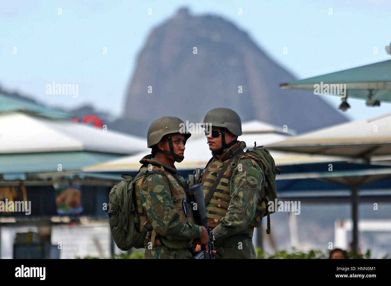 Rio De Janeiro, Brazil. 14th Feb, 2017. Military members patrol on the ...