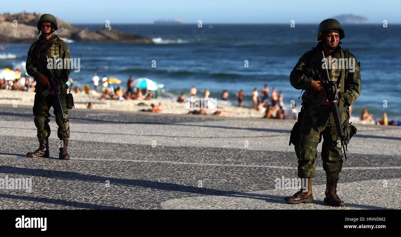 Rio De Janeiro, Brazil. 14th Feb, 2017. Military members patrol on the ...