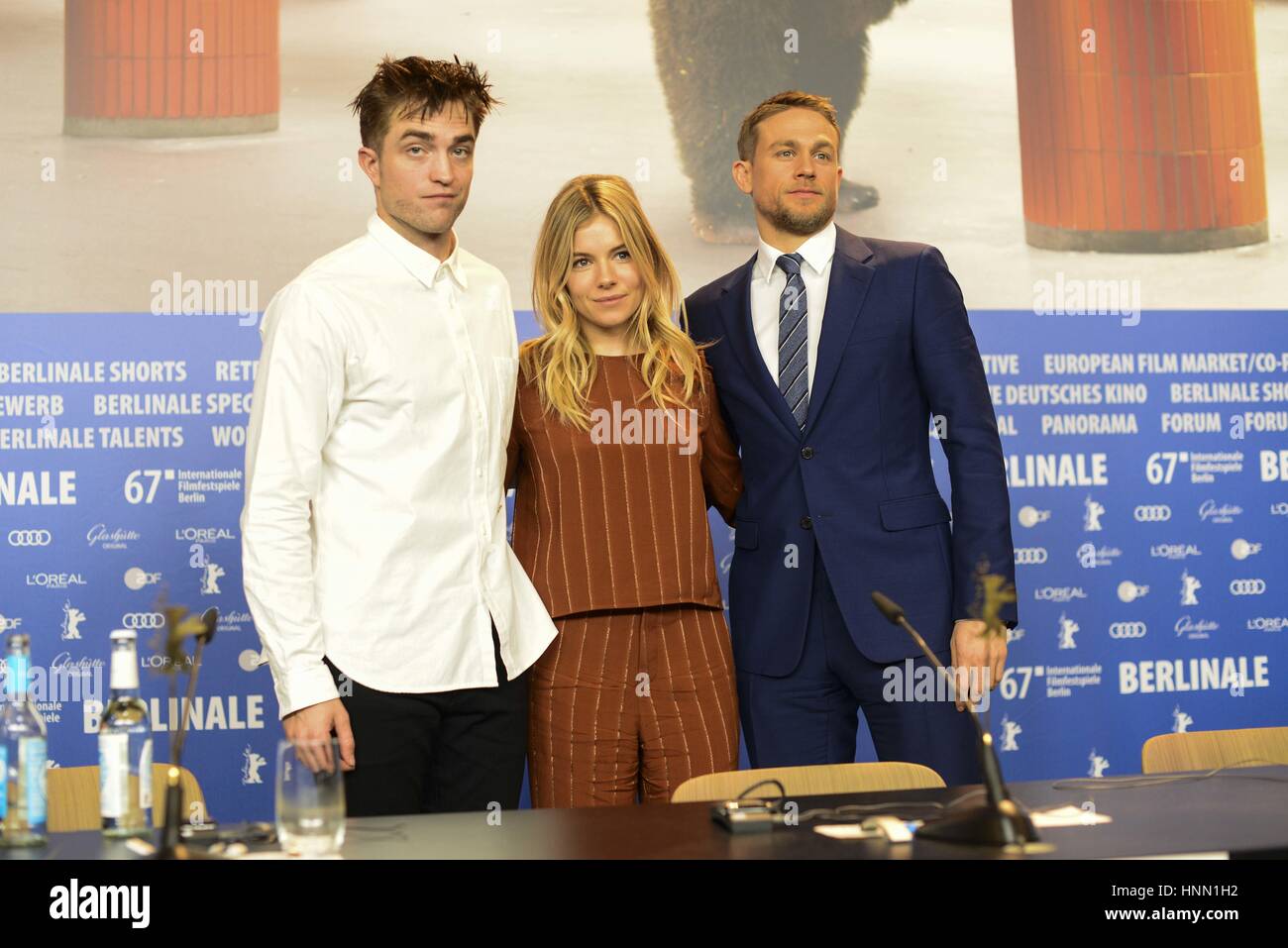 Actor Robert Pattinson, actress Sienna Miller and actor Charlie Hunnam ...