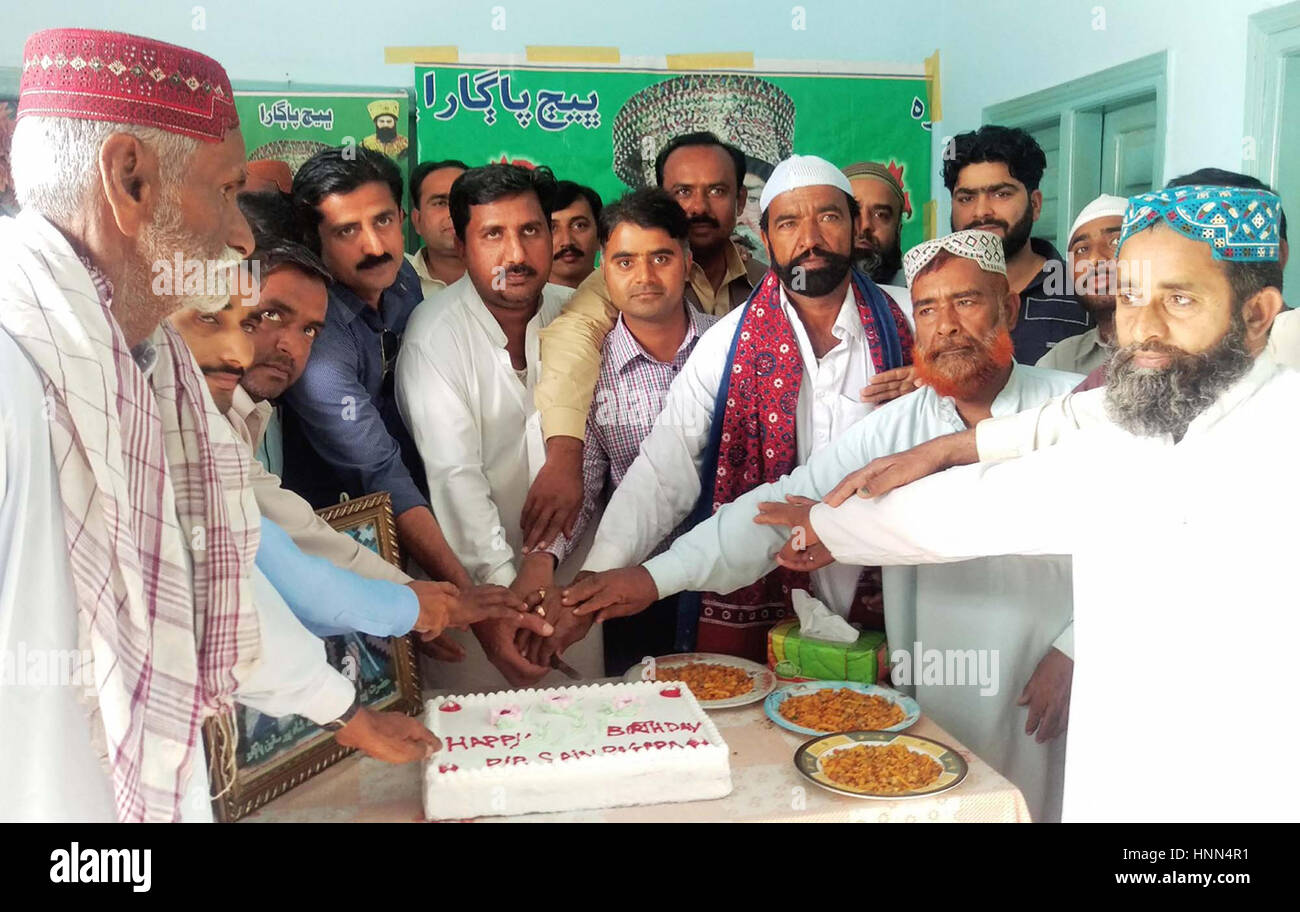 Members of Hur Community are cutting cake on 60th Birthday of Pir Sahab ...