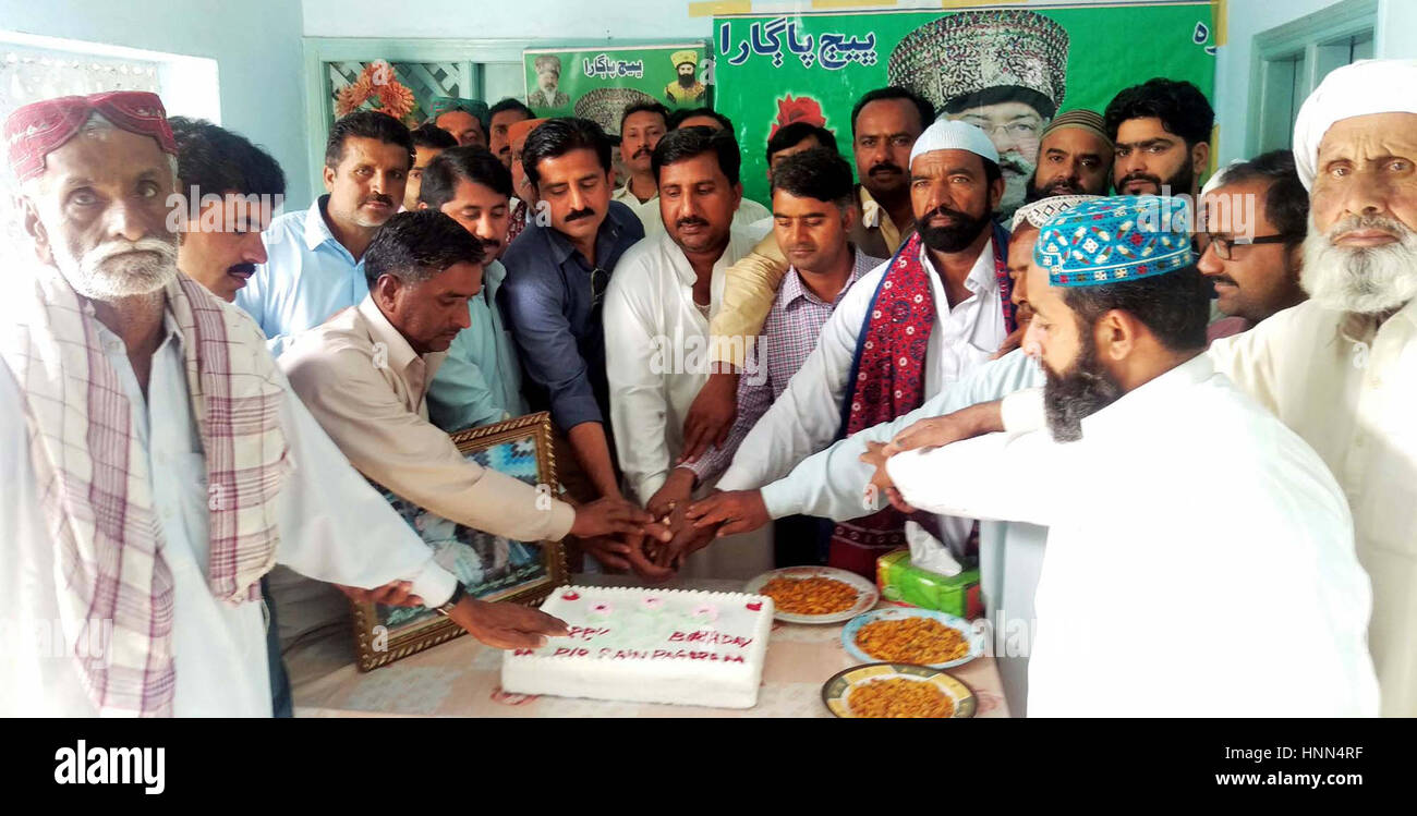 Members of Hur Community are cutting cake on 60th Birthday of Pir Sahab ...