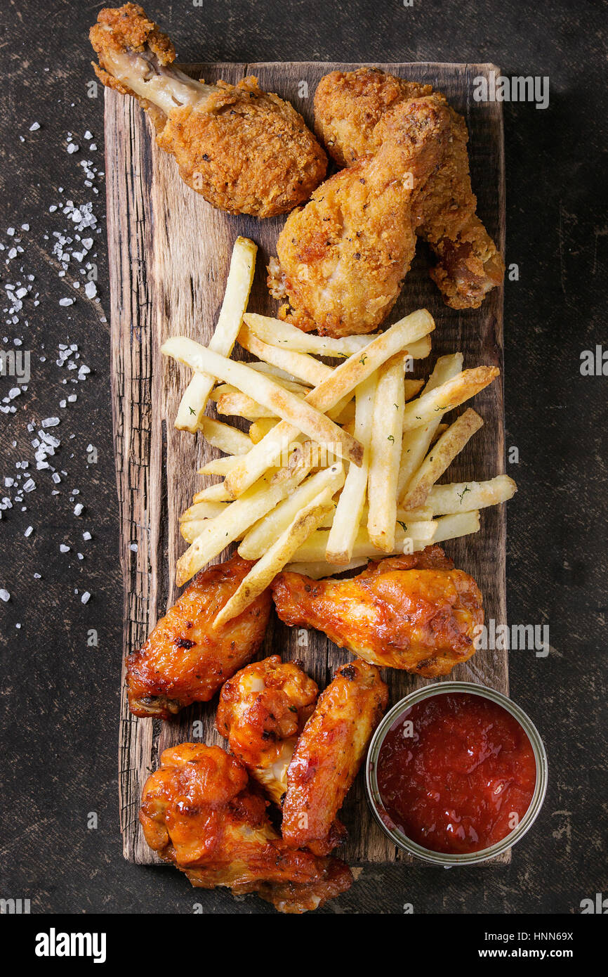 Fried chicken legs with french fries Stock Photo - Alamy