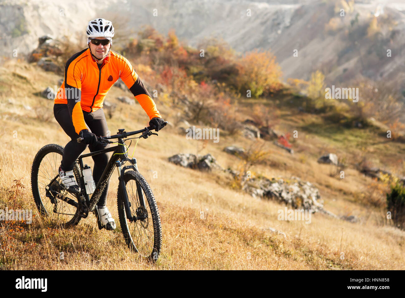 Cyclist Riding the Bike on the Beautiful Spring Mountain Trail Stock ...