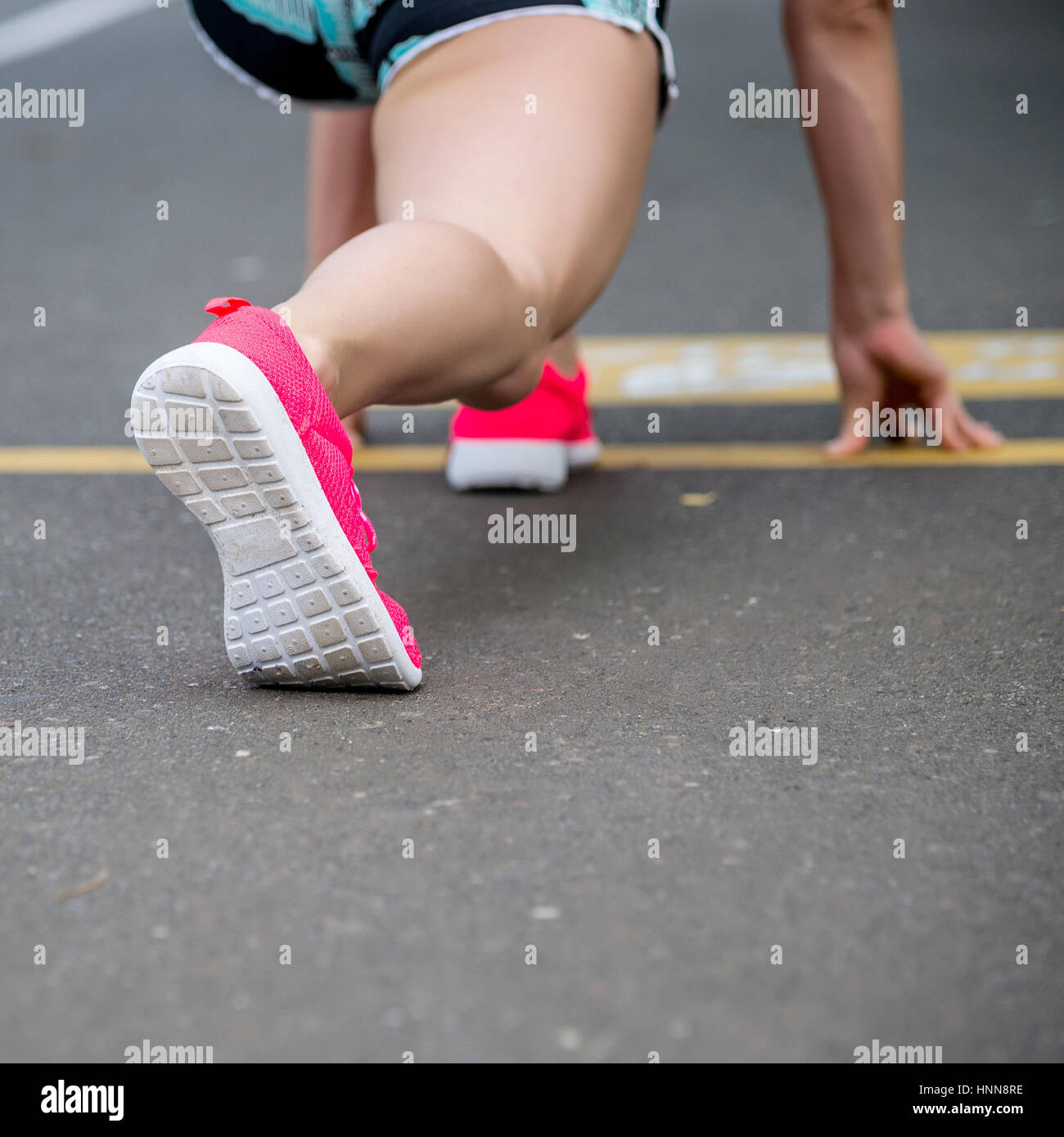 feet running on road closeup on shoe Stock Photo - Alamy
