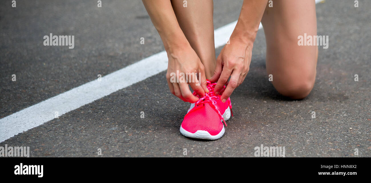 feet running on road closeup on shoe Stock Photo - Alamy
