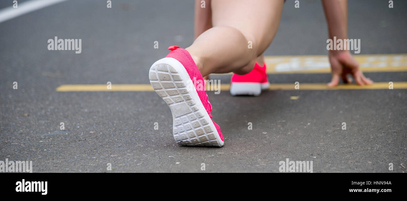 feet running on road closeup on shoe Stock Photo - Alamy