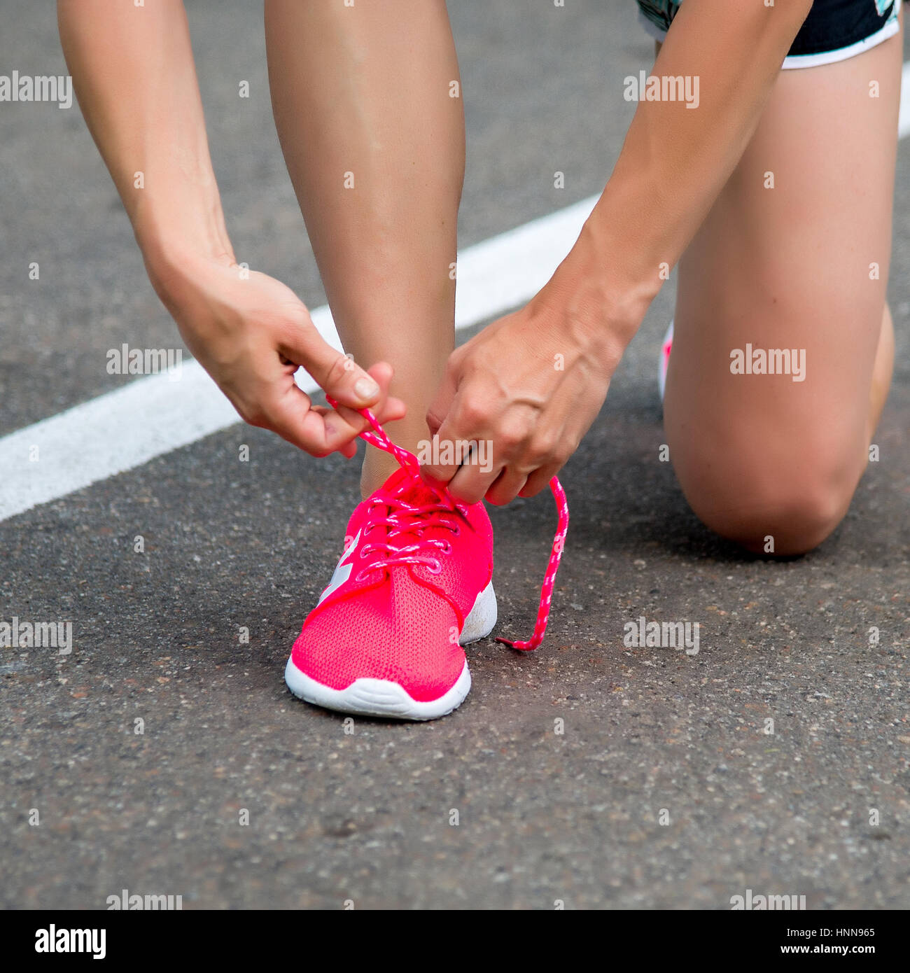 feet running on road closeup on shoe Stock Photo - Alamy