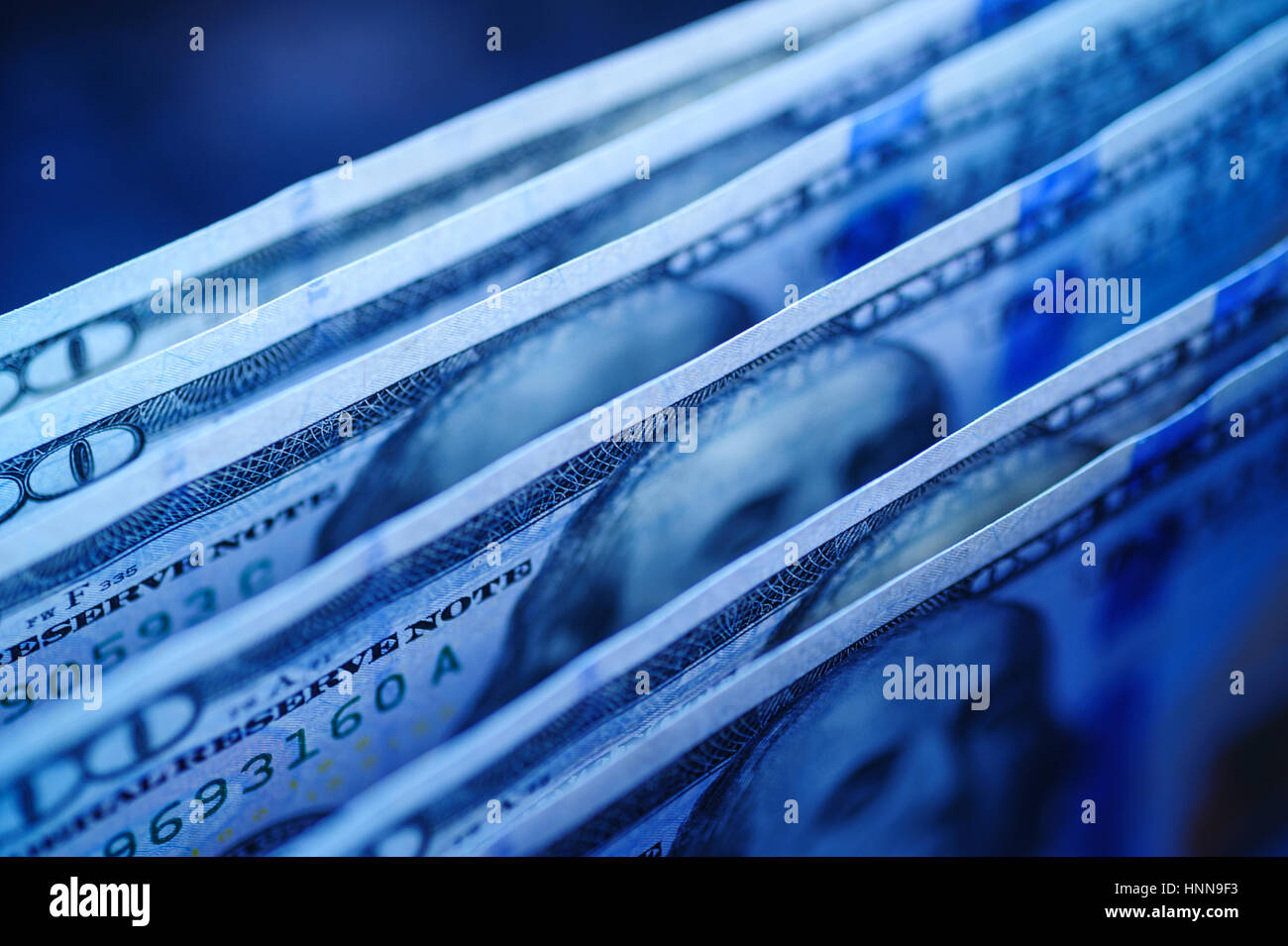 texture of dollar bills in blue tones Stock Photo - Alamy