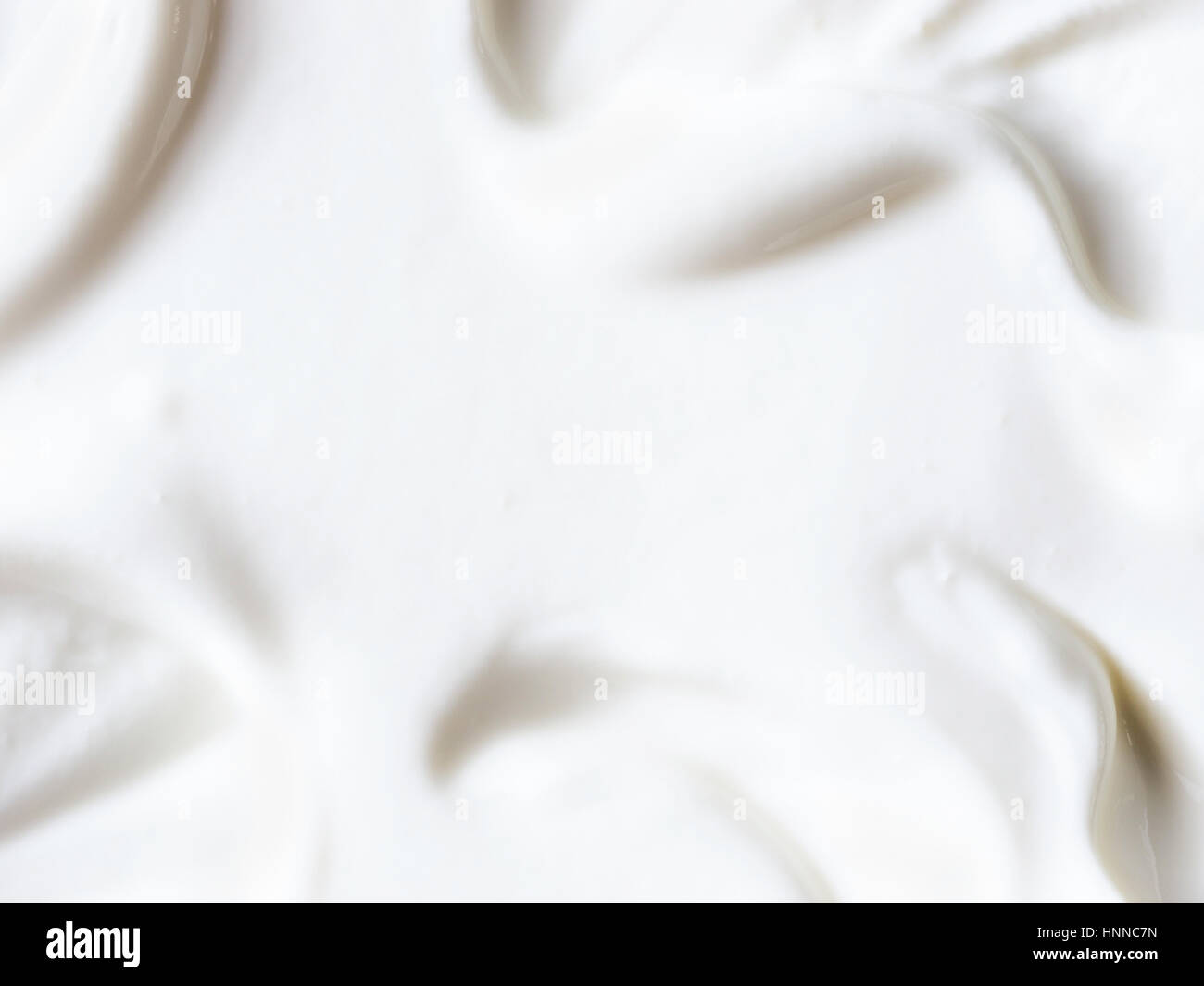 greek yogurt or sour cream texture close up with copy space. Top view ...