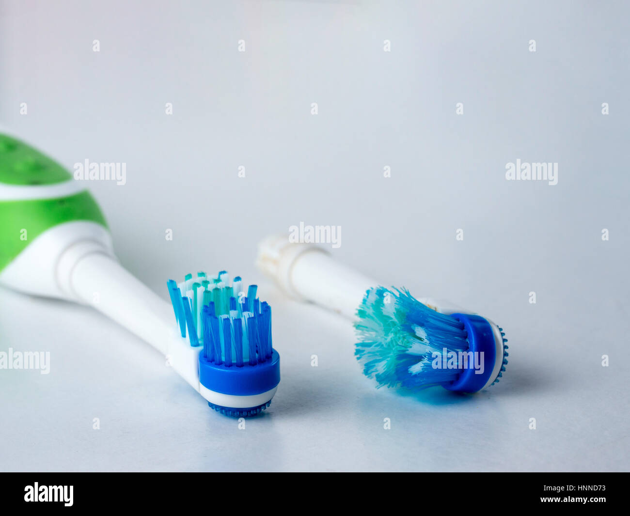 New and old nozzle electric toothbrushes Stock Photo - Alamy