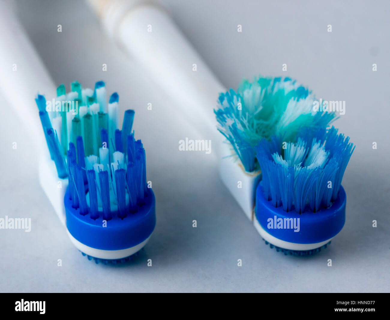 New and old nozzle electric toothbrushes Stock Photo - Alamy