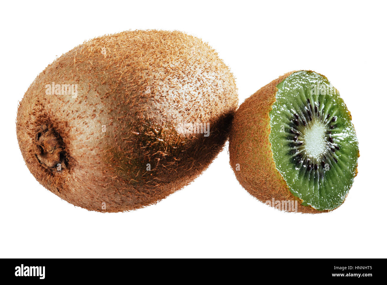 Whole kiwi fruit and his sliced segments isolated Stock Photo - Alamy