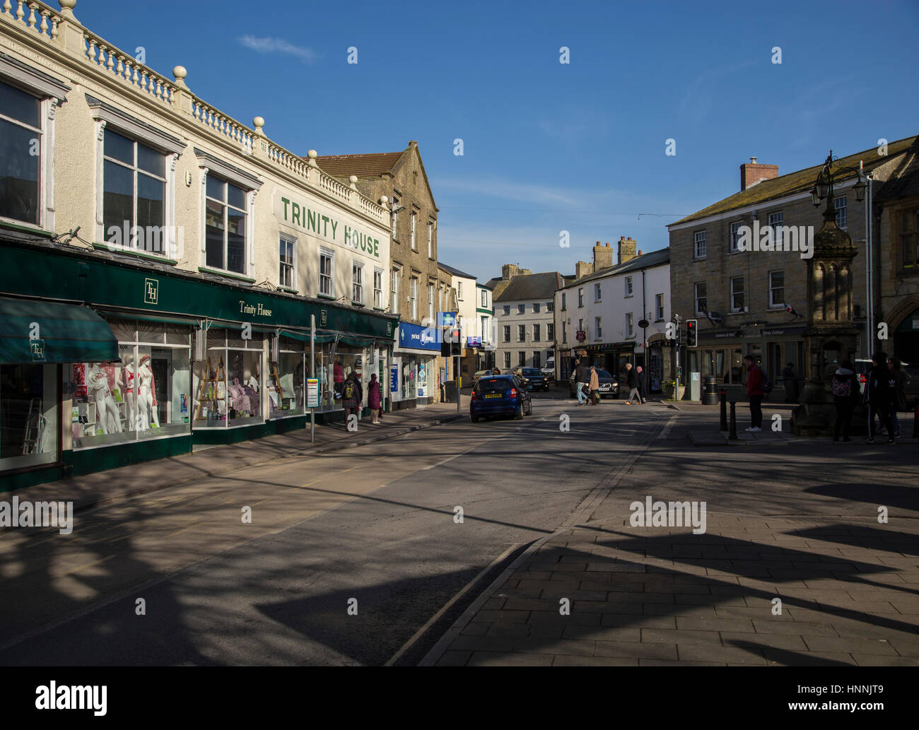 Shopping on West Street in the centre of Axminster, Devon, Boots the ...