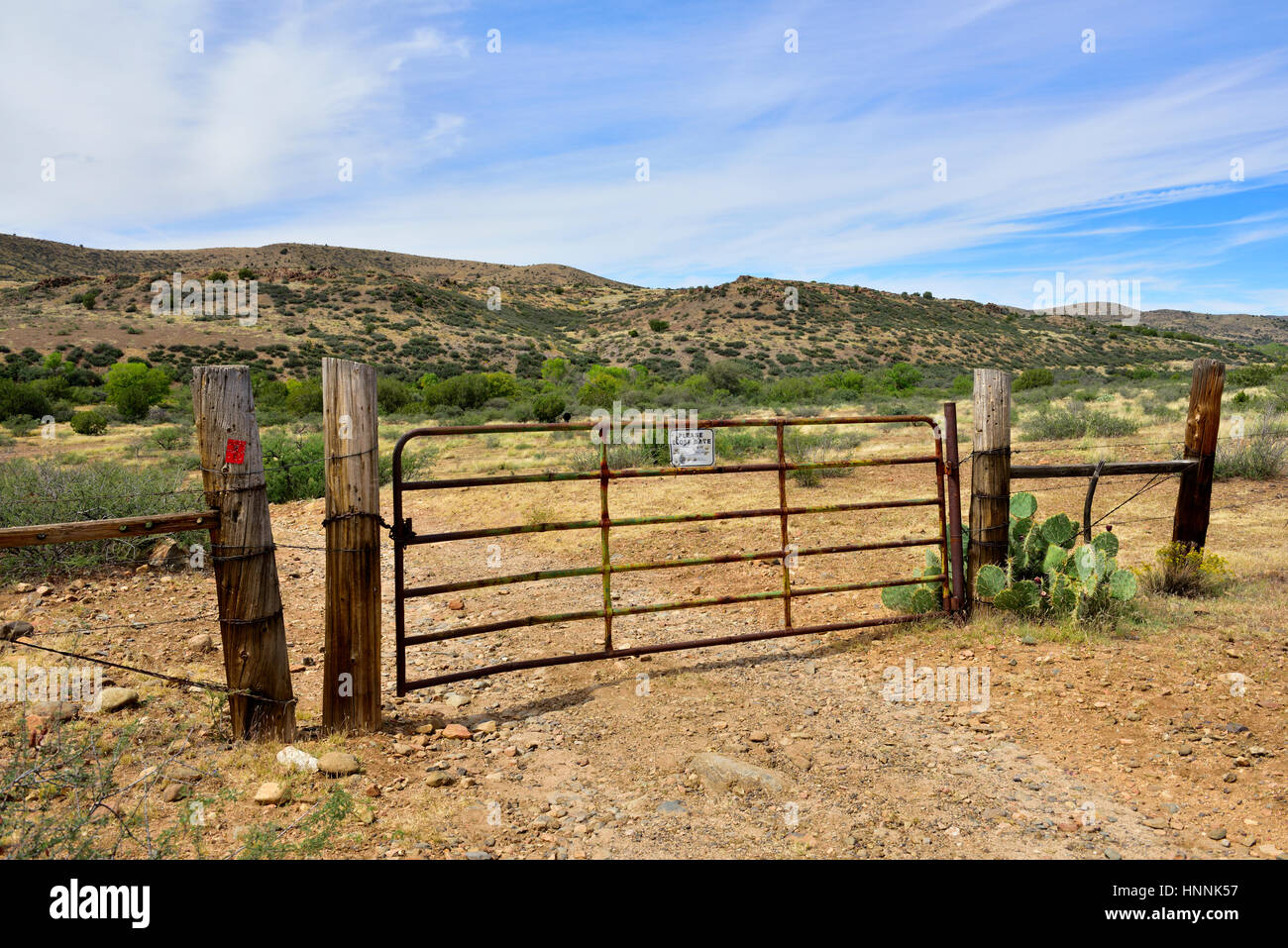 Old rusty gate, ranch land in Countryside near Dewey Arizona, USA Stock ...