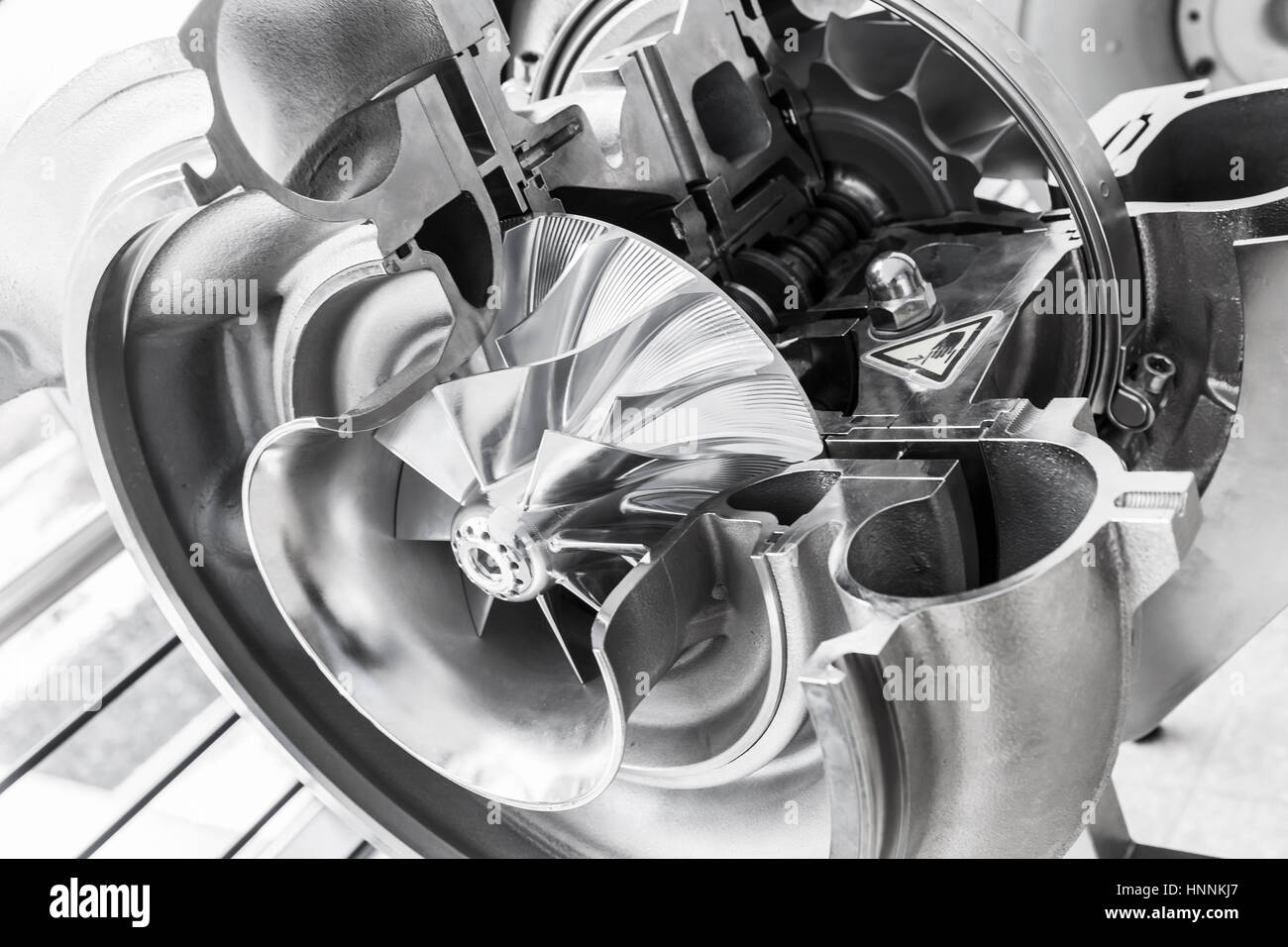 Turbocharger structure with cross section, black and white photo with ...