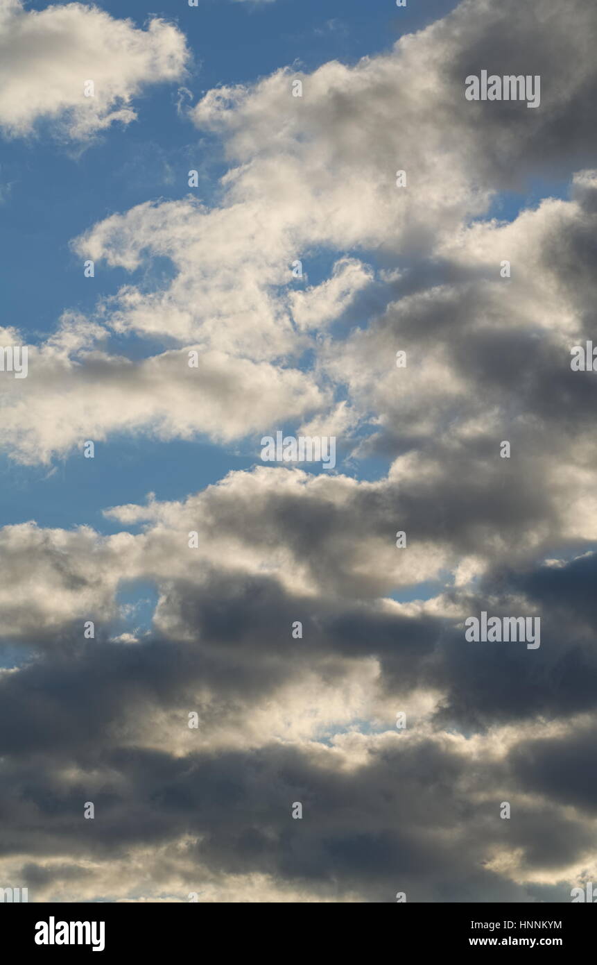 Grey Clouds on the Blue Sky Vertical Cloudscape Stock Photo - Alamy