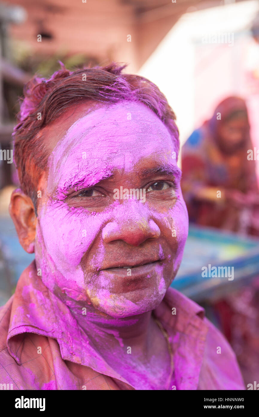 Coloured dye throwing and face smearing of bright coloured powder ...