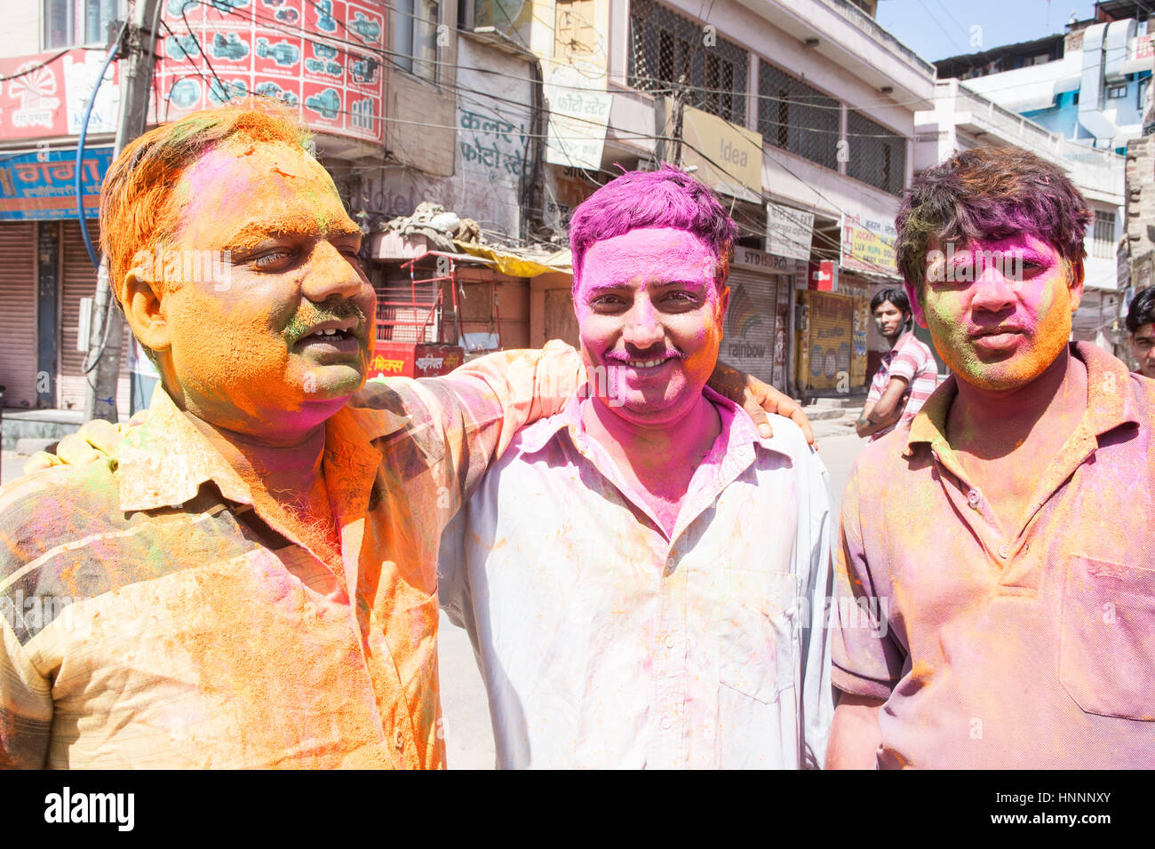 Coloured dye throwing and face smearing of bright coloured powder ...