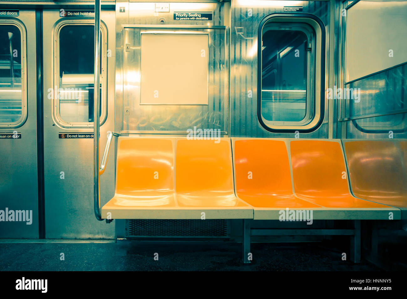 New York City seats on empty subway train car with vintage tone filter ...