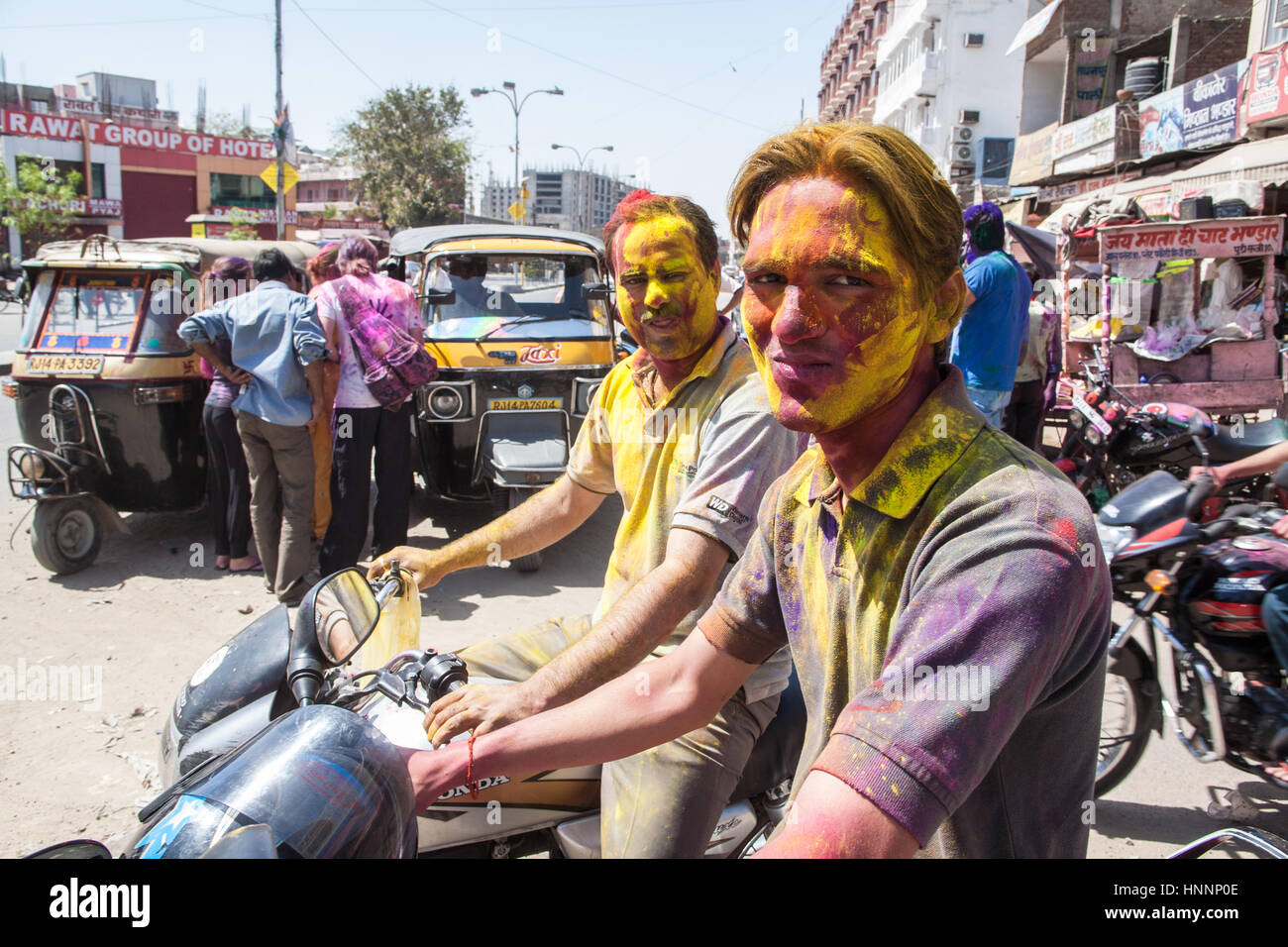 Coloured dye throwing and face smearing of bright coloured powder ...
