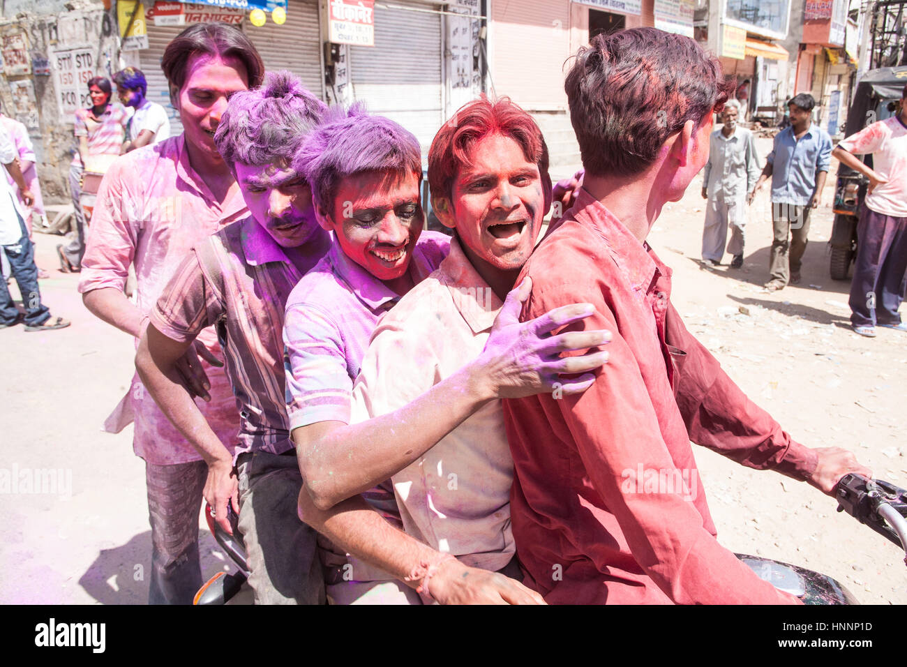 Coloured dye throwing and face smearing of bright coloured powder ...