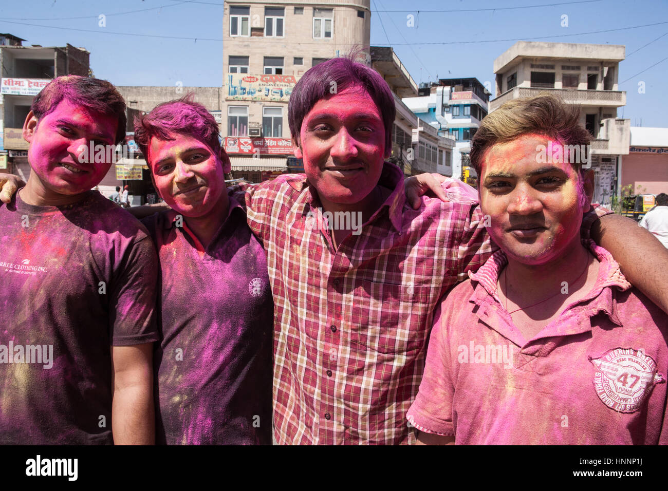 Coloured dye throwing and face smearing of bright coloured powder ...