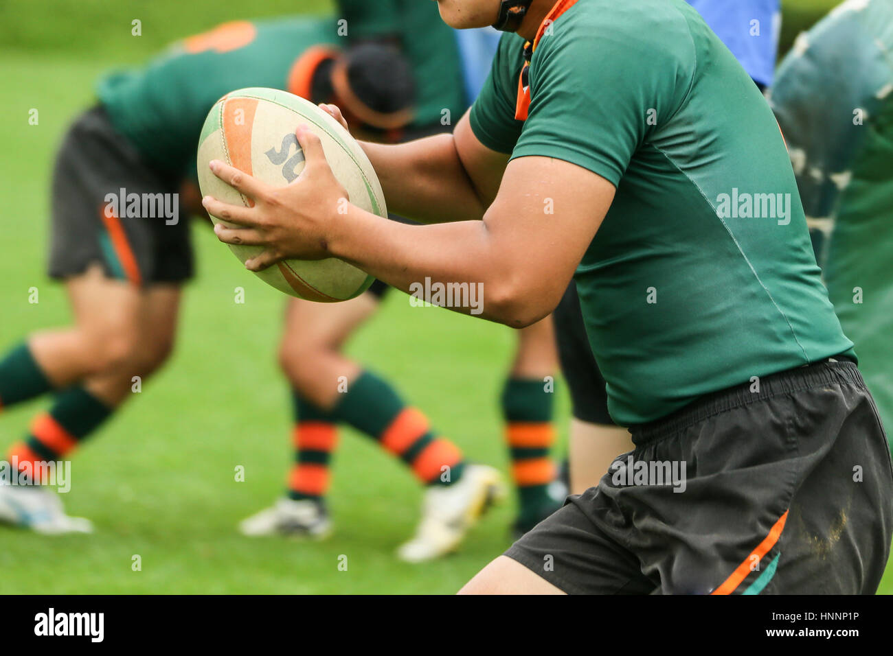 Male student rugby ball hi-res stock photography and images - Alamy