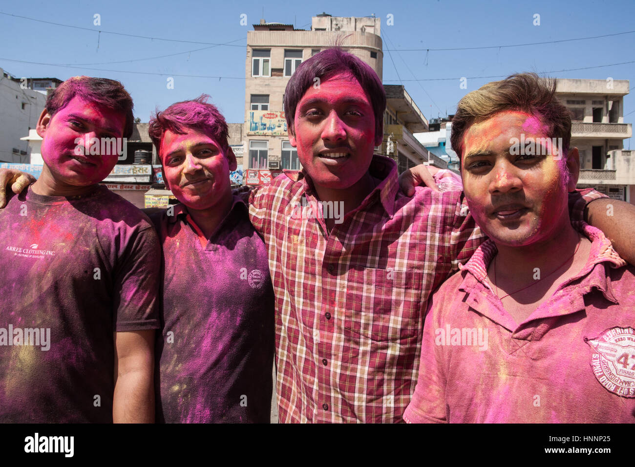 Coloured dye throwing and face smearing of bright coloured powder ...