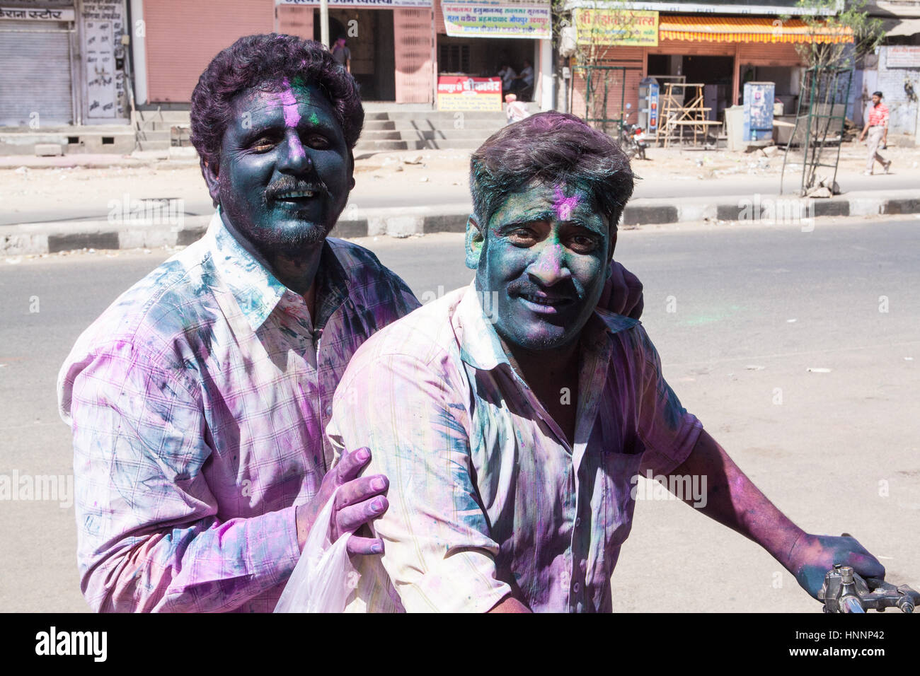 Coloured dye throwing and face smearing of bright coloured powder ...