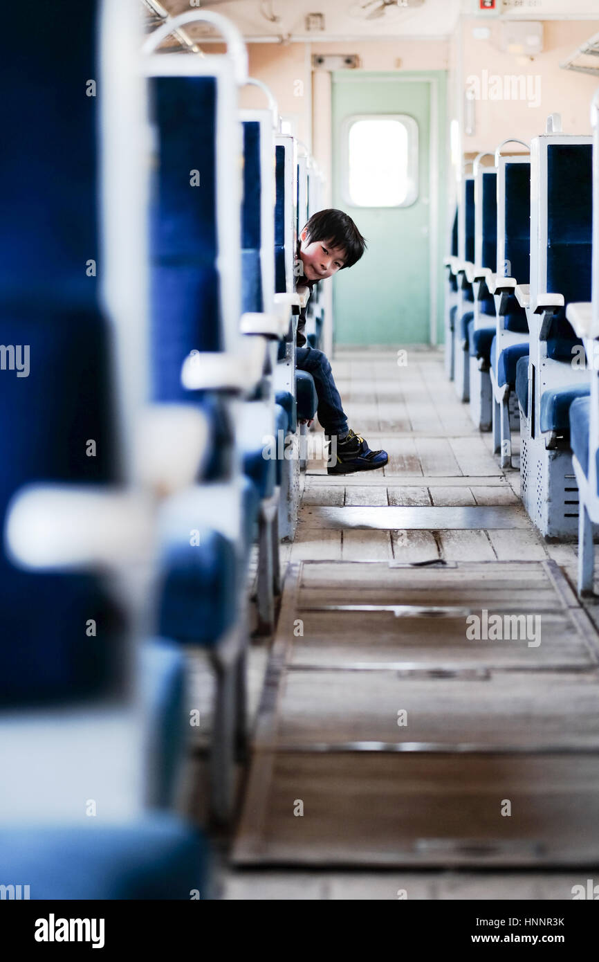 A boy riding train Stock Photo - Alamy
