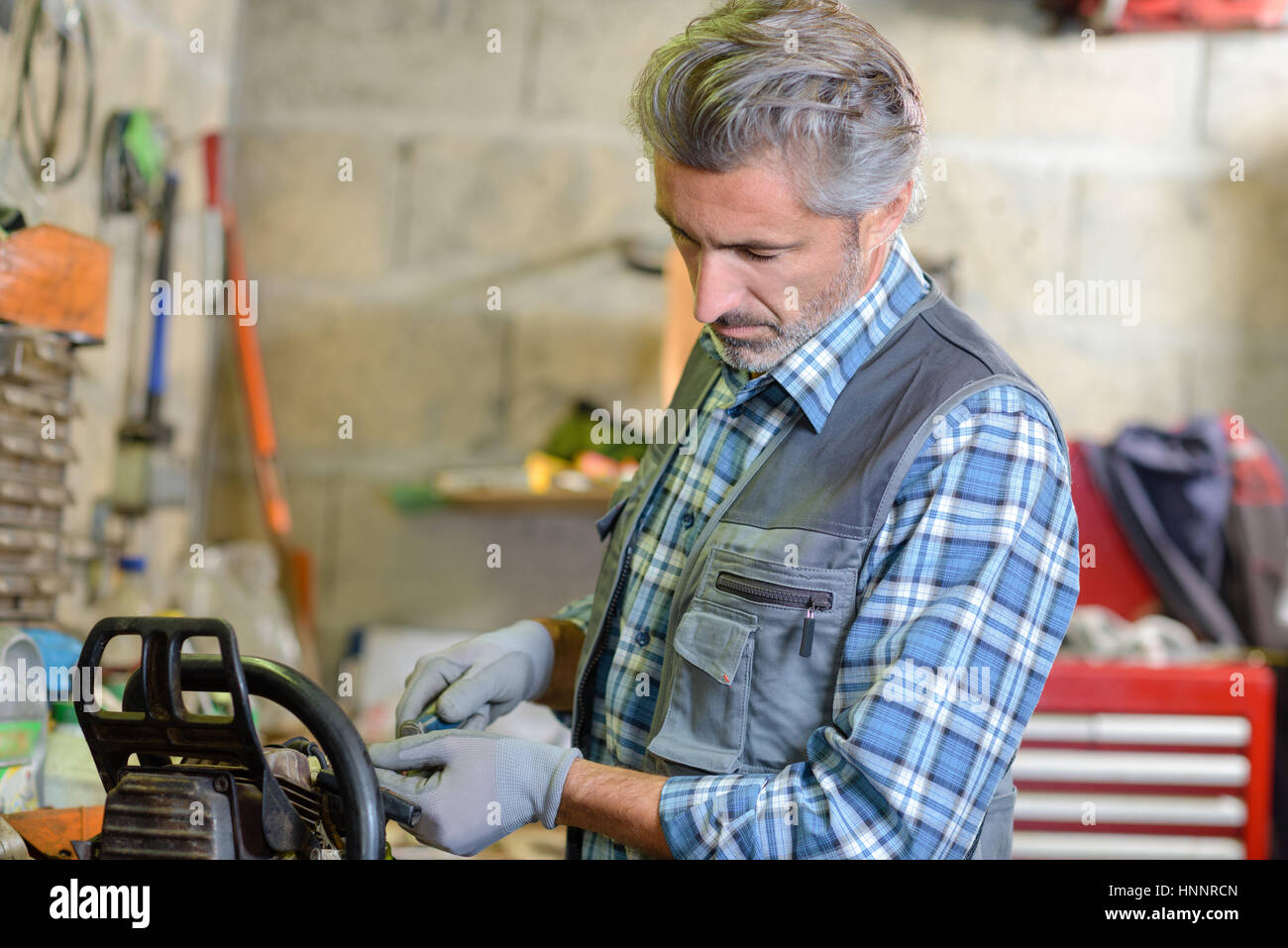 fixing a broken equipment Stock Photo - Alamy