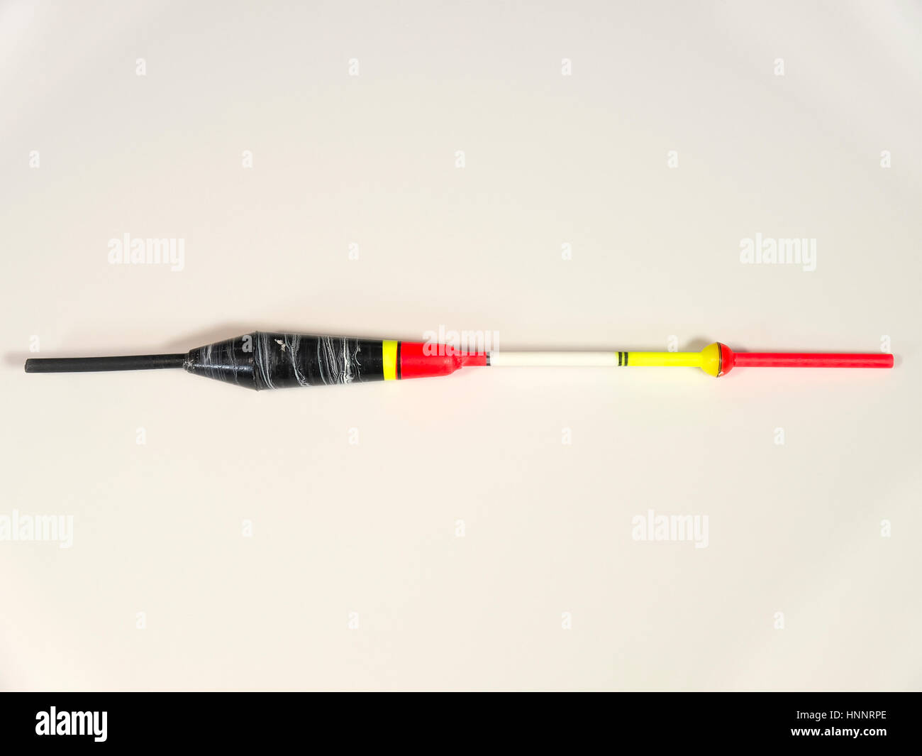 The fishing float isolated on white background Stock Photo - Alamy