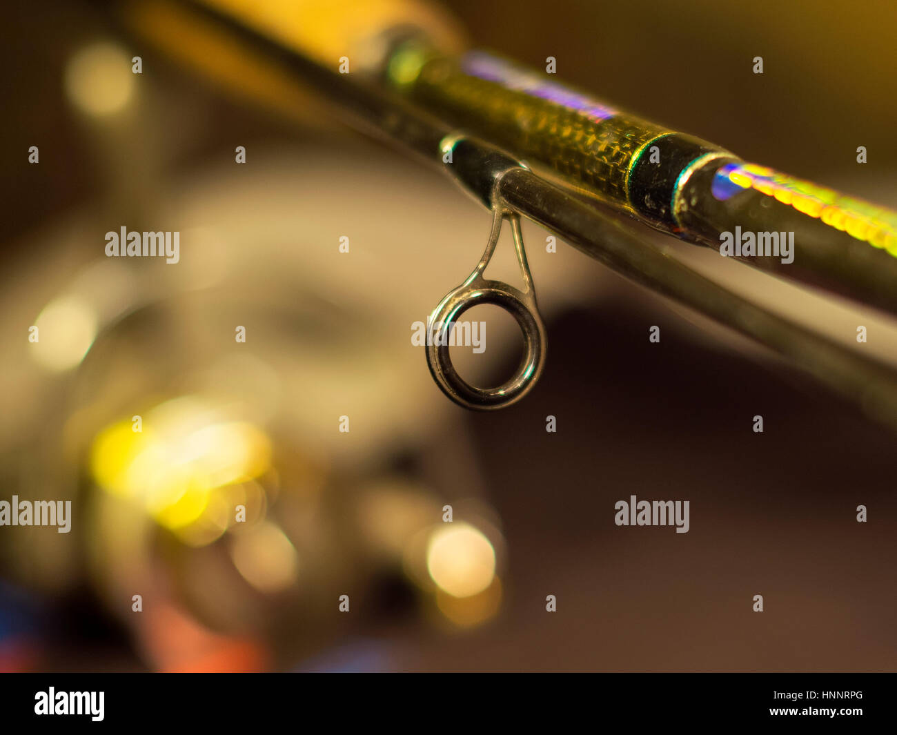 The graphite ring on the fishing rod Stock Photo - Alamy