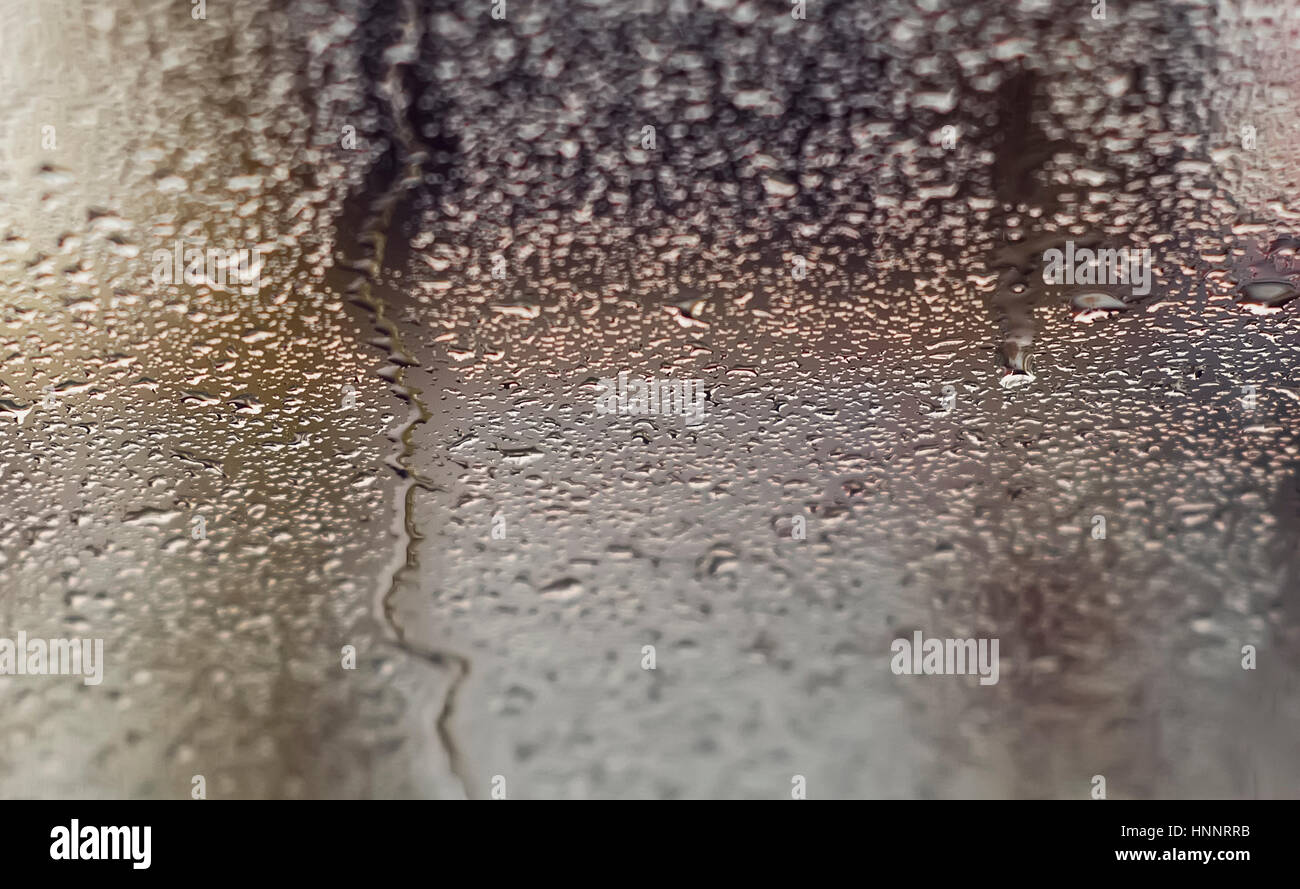 Closeup image of the raindrops on a car windshield Stock Photo - Alamy