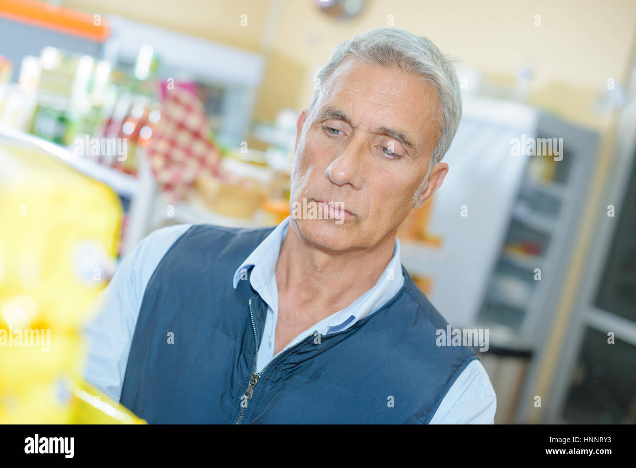 man in the store Stock Photo - Alamy