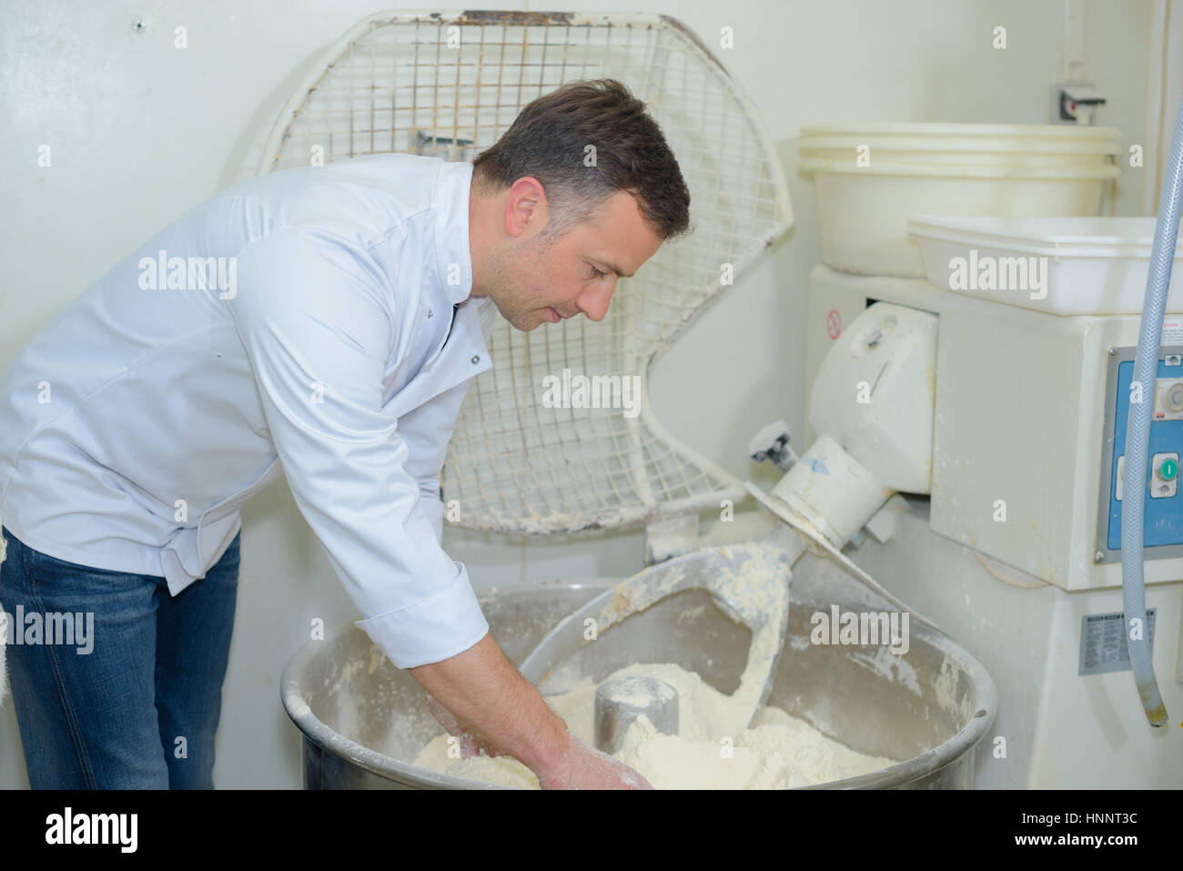 mixing in a large machine Stock Photo - Alamy