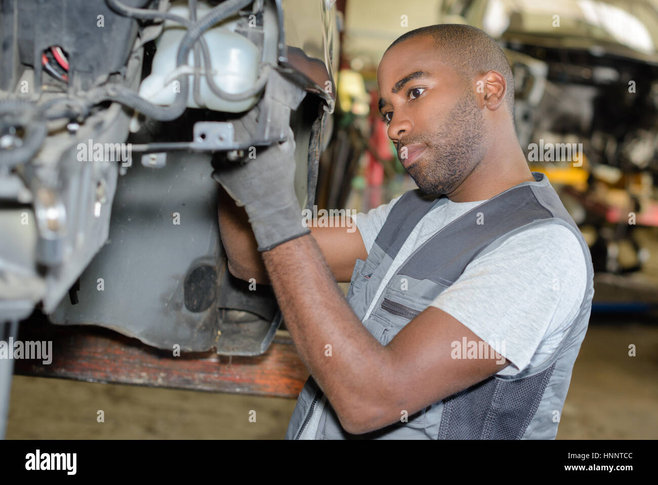 mechanic solving a problem Stock Photo - Alamy